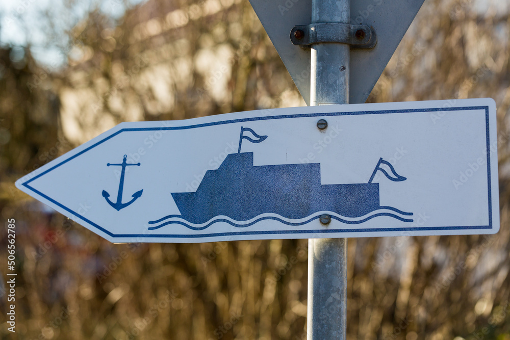 Sign with a black boat and an ankor (at Lake Ammersee). Indicating the ...