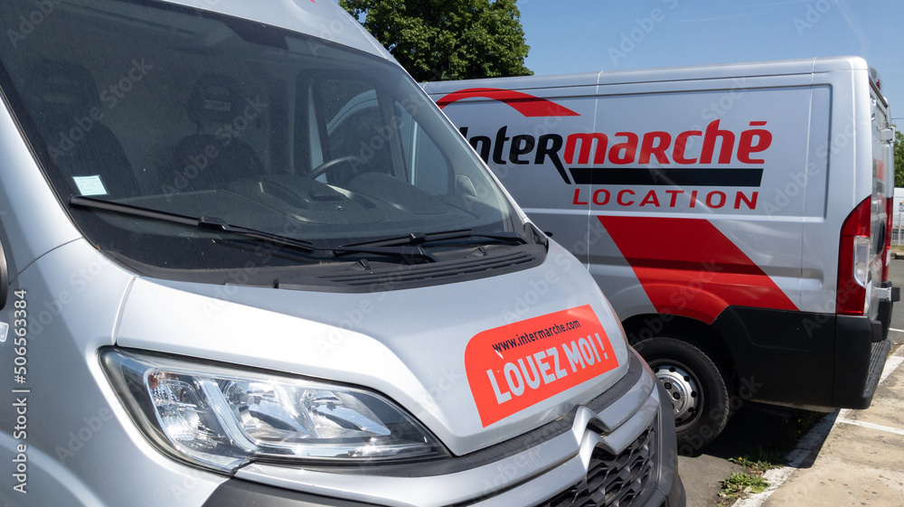 intermarche location logo sign and text brand on panel truck hire ...