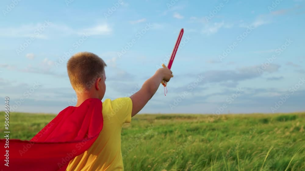Vídeo do Stock: Child waves toy sword, childhood dreams. Child boy ...