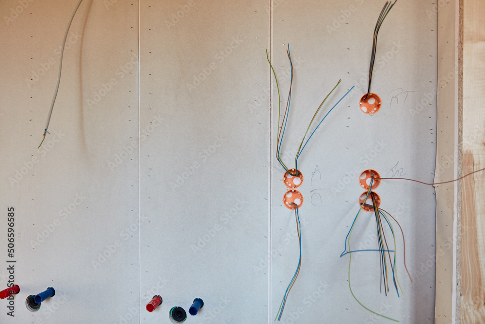 Wall with cables for electrical installation in interior design Stock ...