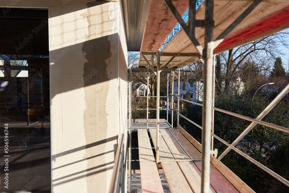 Construction site with scaffolding for new construction or renovation ...