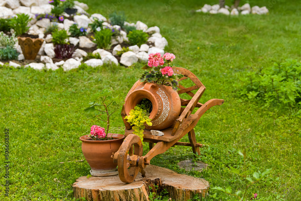 Beautiful garden design idea. Clay pots used as pot for flowers ...