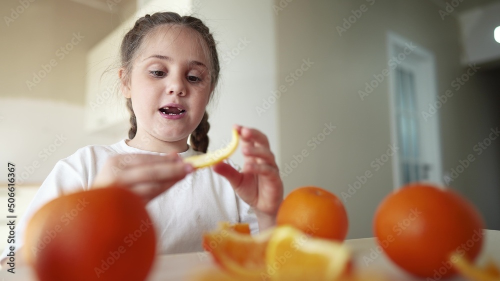 girl child eating oranges. dream happy family fruit healthy food kid ...