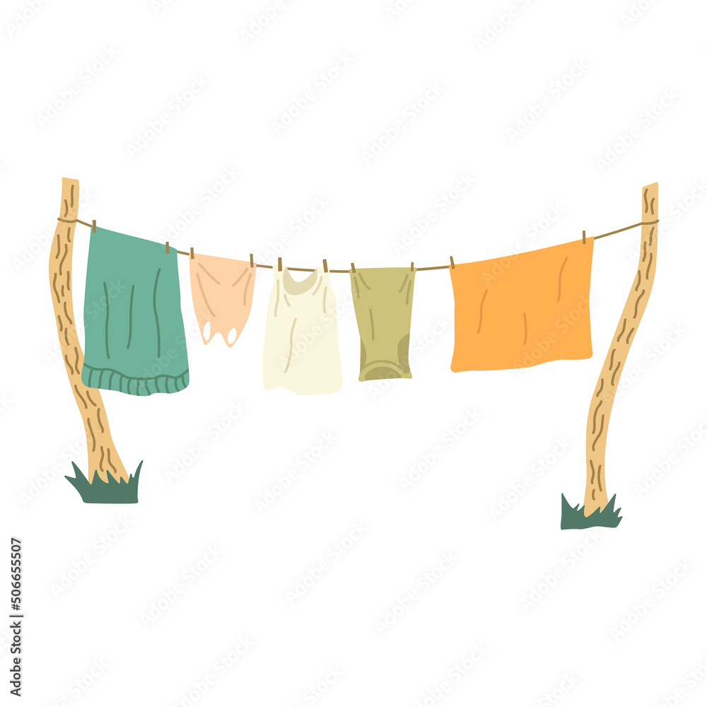 Washed clothes dry outside on a rope stretched between trees. Colorful ...