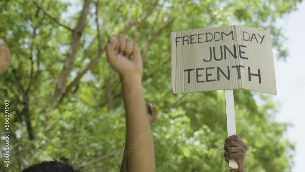 concept of Juneteenth freedom day march showing by close up protesting ...