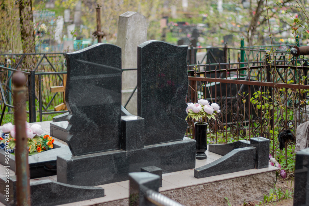 Series of monuments made of black gabbro-diabase granite on the graves ...