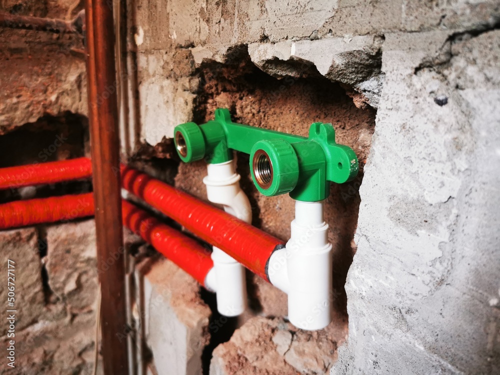 Polypropylene plumbing pipes in the wall. New construction of the ...