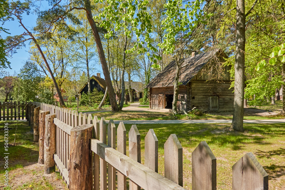 Old rustic wooden house (log cabin). Village. Forest lawn, garden ...