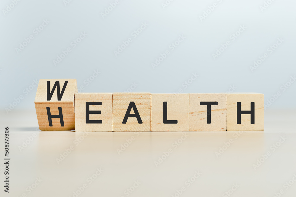 wealth and health concept, word wealth to health on wooden cube blocks ...