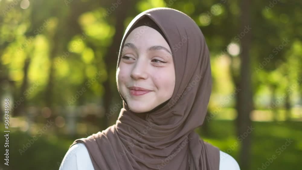 Portrait of smiling muslim teenage girl with beautiful face. Stock ビデオ ...