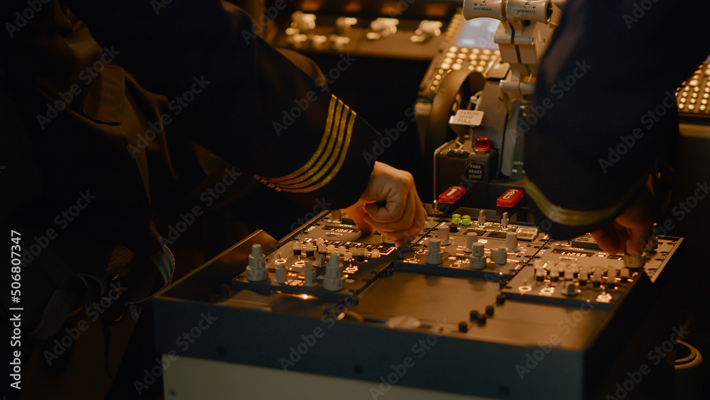 Plane aircrew preparing for aviation flight with dashboard command ...