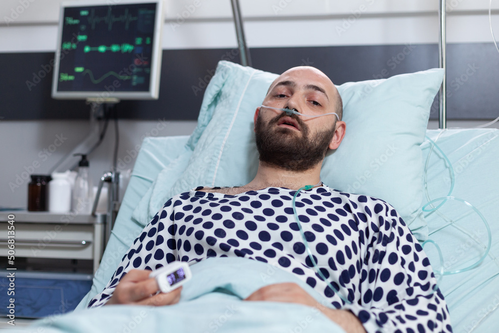 Portrait of patient with breathing problems recieving treatment ...