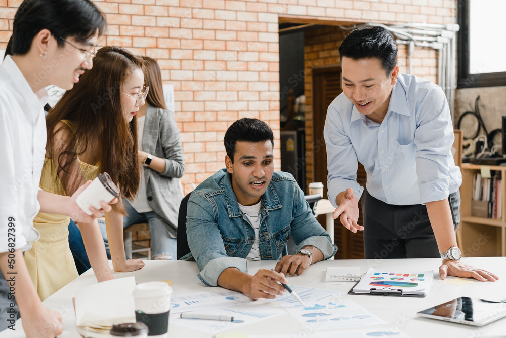 Multiracial group of young creative people in casual wear meeting ...