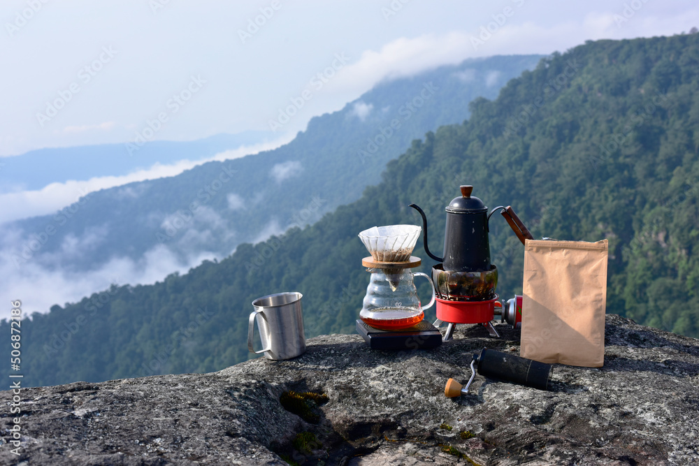 drip coffee , Barista pouring water on coffee ground with filter in ...
