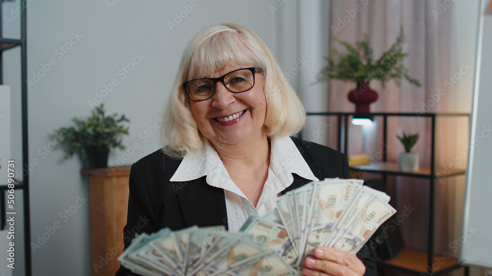 Senior mature banker business woman accountant wears glasses, formal ...