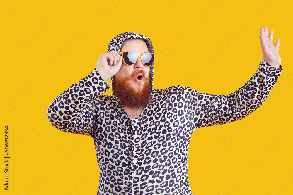 Portrait of funny comic chubby man who is strangely dressed and having ...