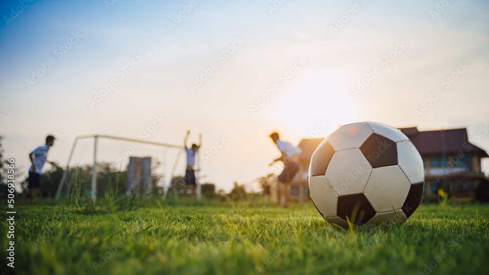 Silhouette action sport outdoors of a group of kids having fun playing ...