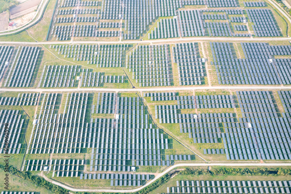 Solar farm, field or solar power plant in aerial view consist of ...