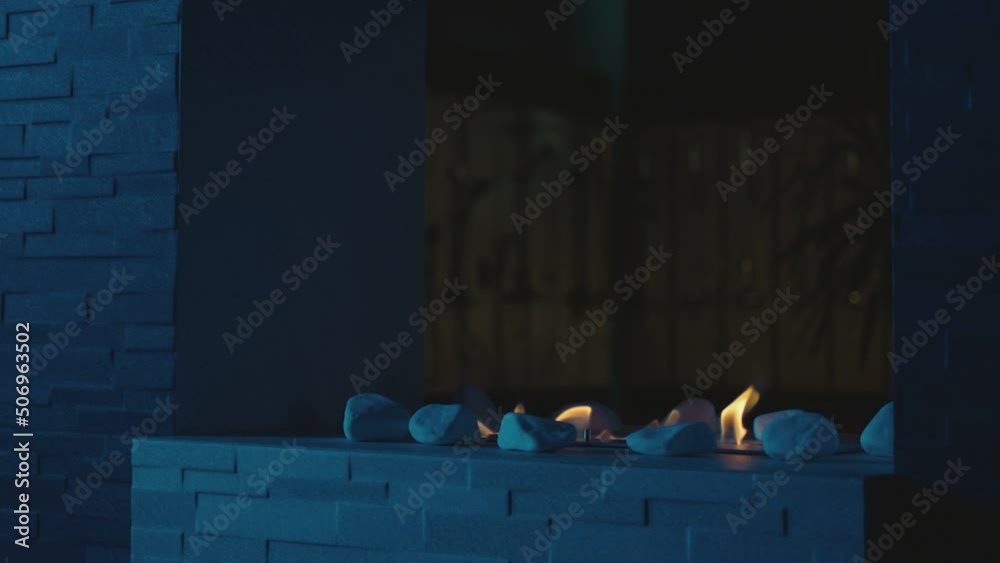 Fireplace inside cozy beautiful modern house . White brick wall ...