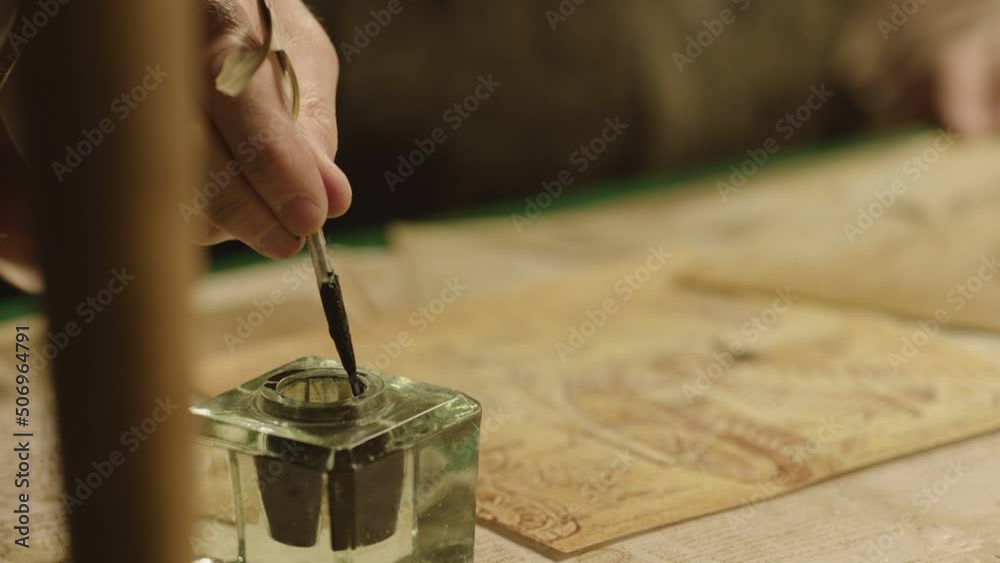 Old man with beard dressed like Leonardo Da Vinci writing , painting ...