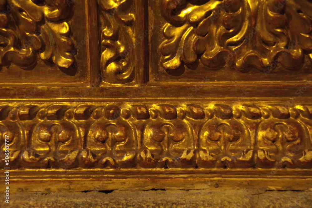 Architectural detail covered in gold leaf in the Church of La Compania ...