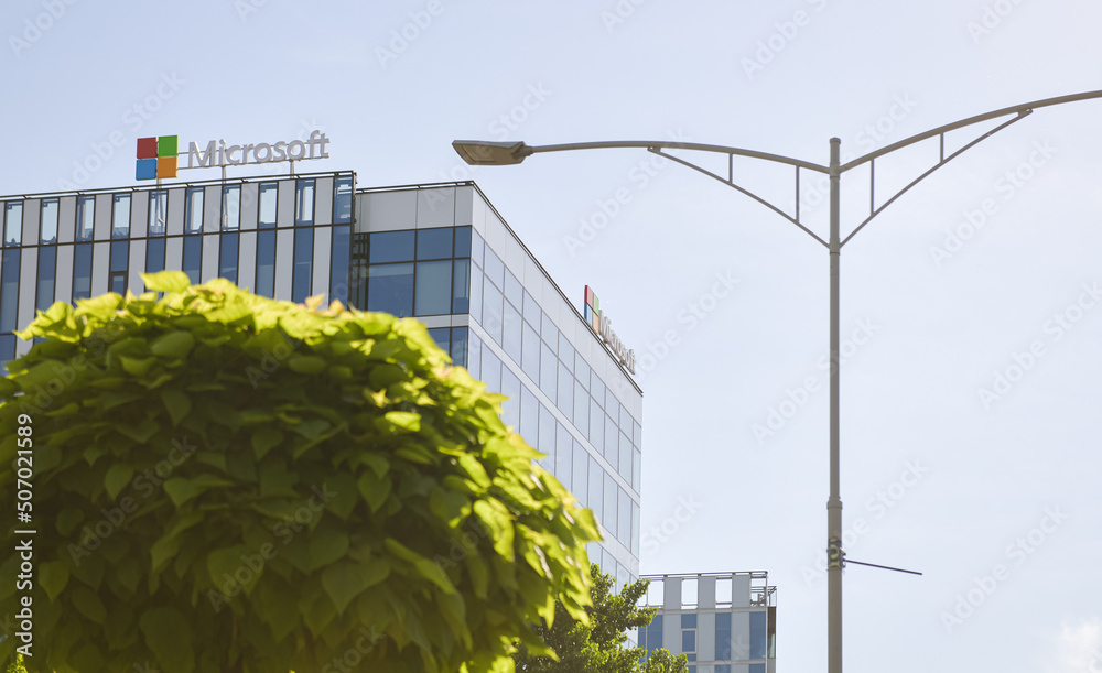 Logo sign of Microsoft company headquarters office building. American ...