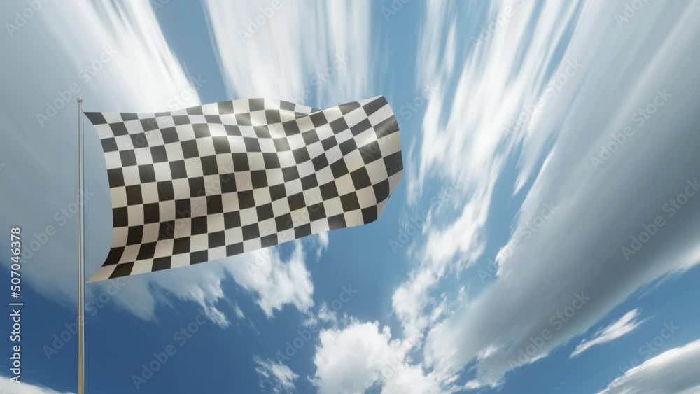End of race checkered flag waving against blue sky with white clouds ...