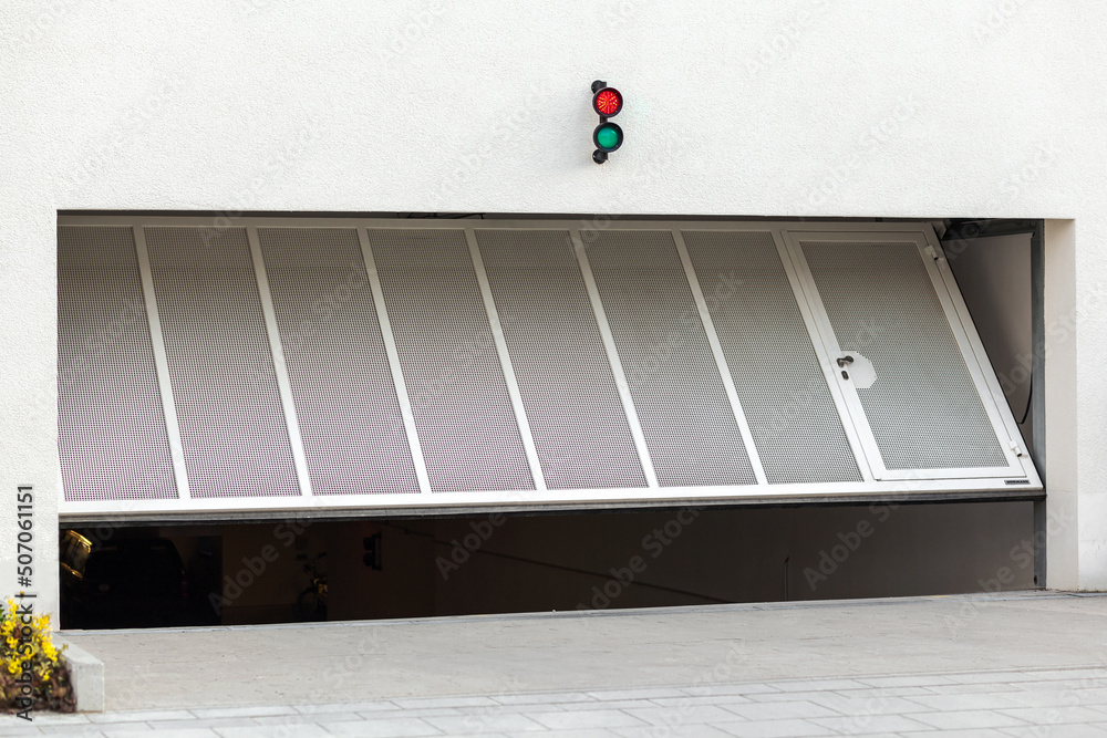 Garage Gate Garage Door Opening to Underground Car Parking. Modern ...