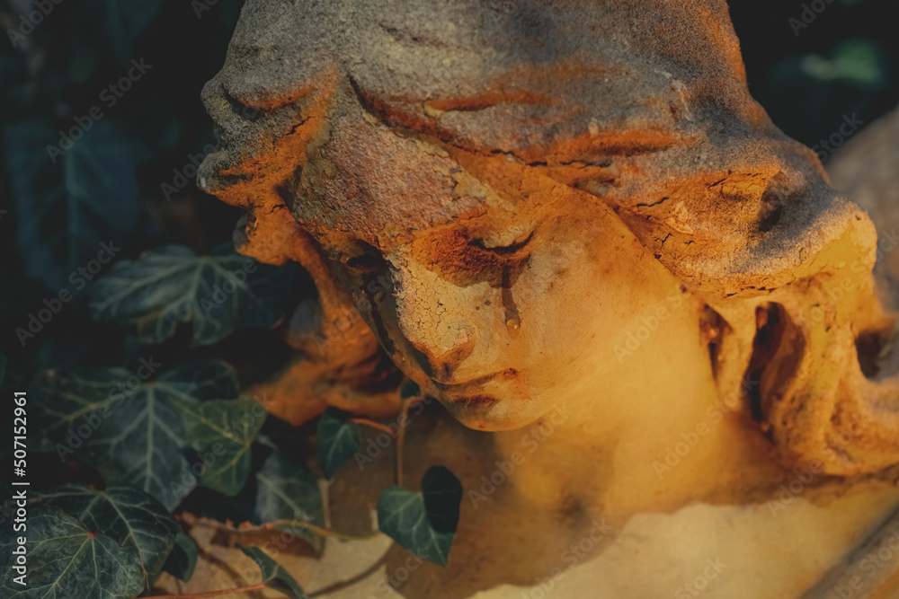 Retro styled image of beautiful sensual angel crying as symbol of pain ...