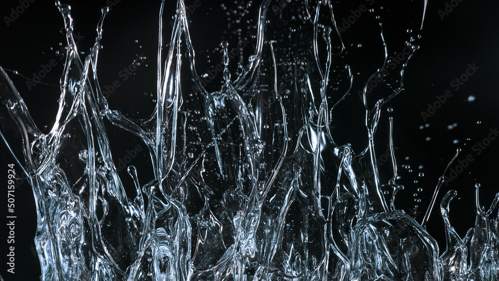Freeze motion of water splash on black background. Filmed on high speed ...