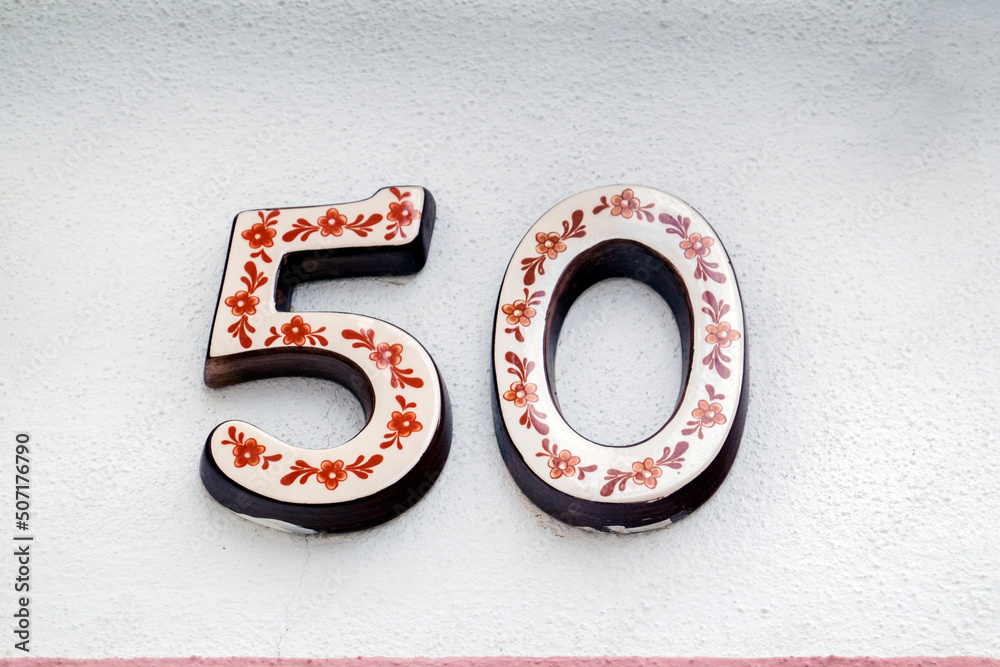 Beautiful house number fifty in azulejo Stock Photo | Adobe Stock