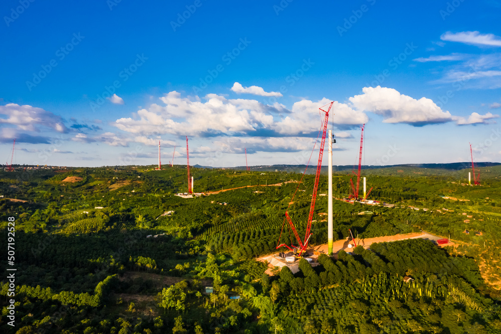 Installing of wind turbine tower with construction crane, Power plant ...