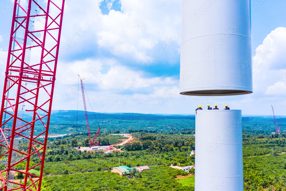 Installing of wind turbine tower with construction crane, Power plant ...