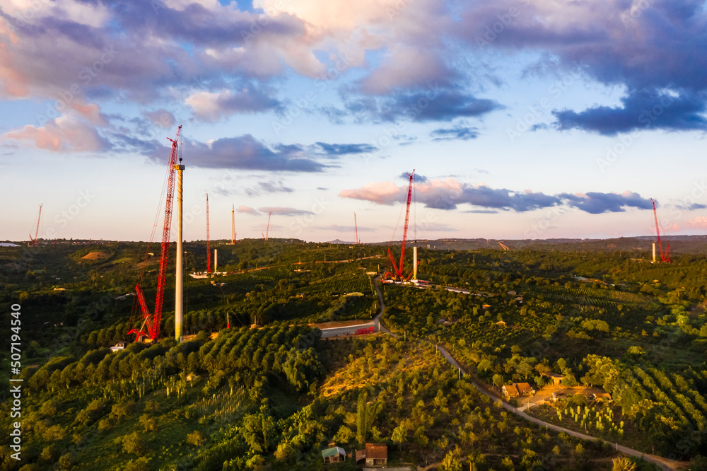 Installing of wind turbine tower with construction crane, Power plant ...