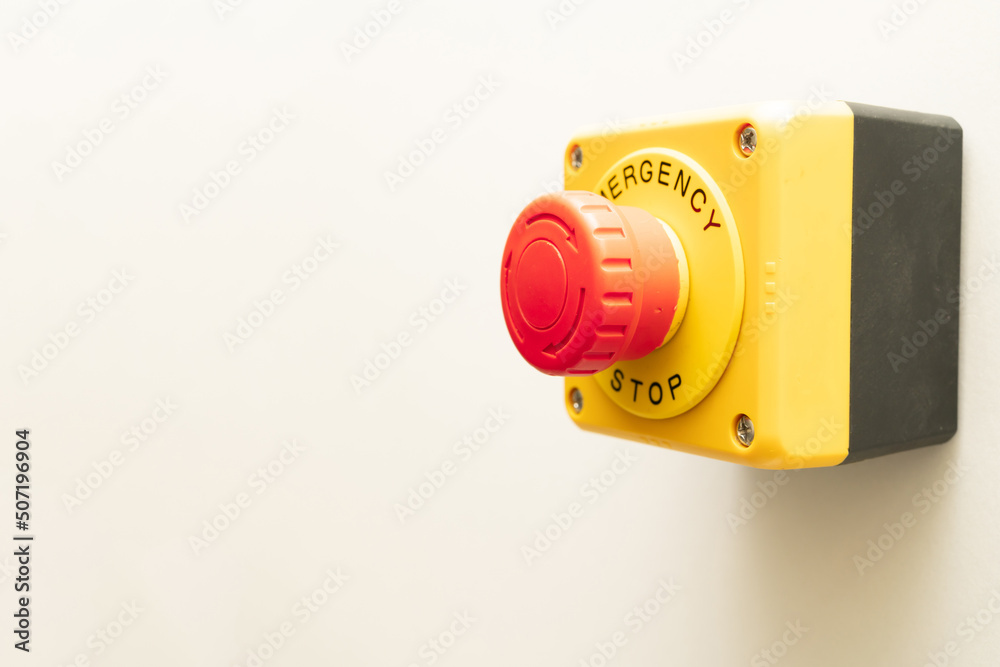 Stop Button and the Hand of Worker About to Press it. emergency stop ...