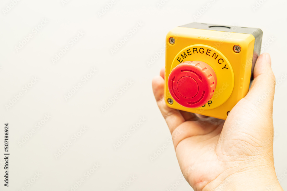 Foto de Stop Button and the Hand of Worker About to Press it. emergency ...