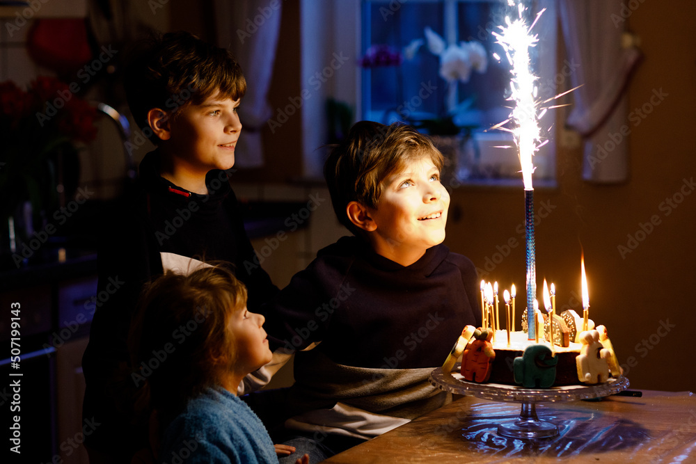 Two beautiful kids, little preschool boys and little toddler girl ...