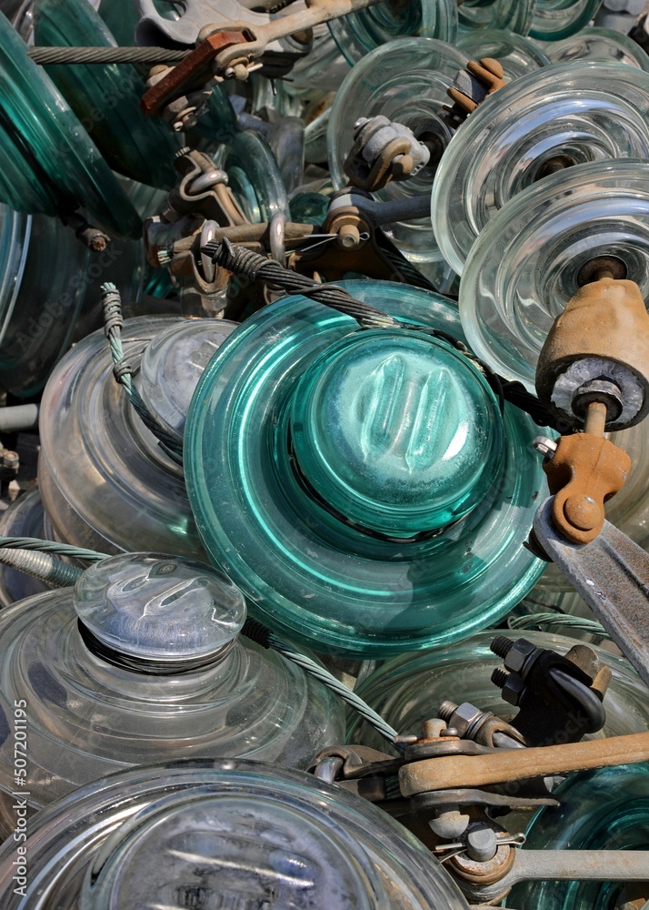 glass insulators used in high voltage power lines to insulate ...