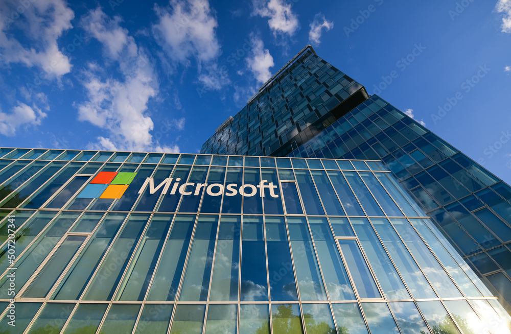 Logo of Microsoft company headquarters office building. American ...