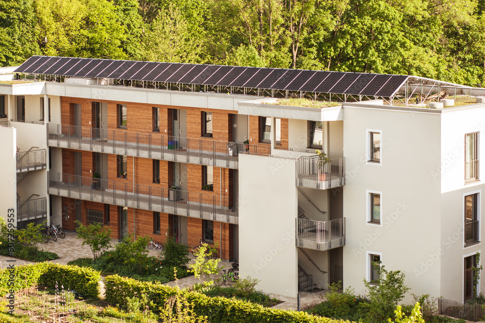 Solar panels on House Roof. Modern apartment building with solar ...