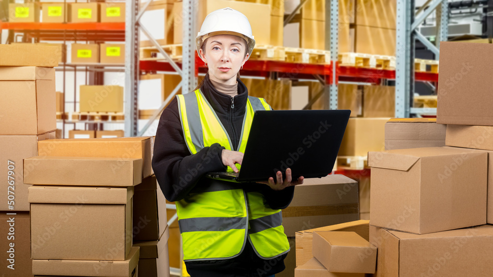 Woman with cardboard boxes. Girl logistician in front of empty ...