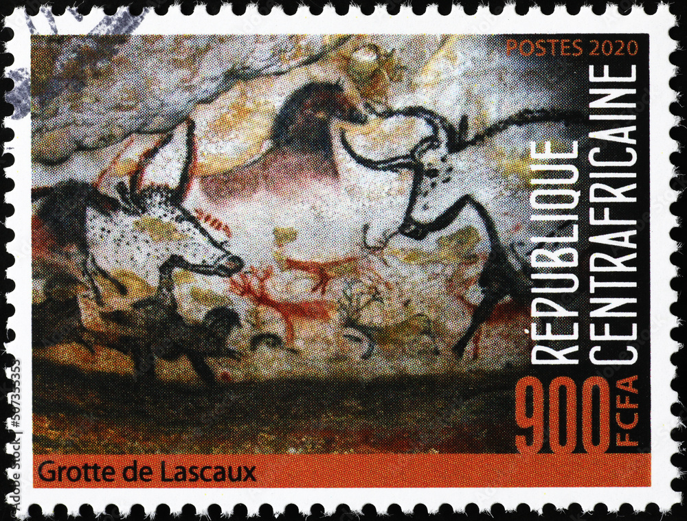 Prehistoric depictions of animals from Lascaux caves on stamp Stock ...