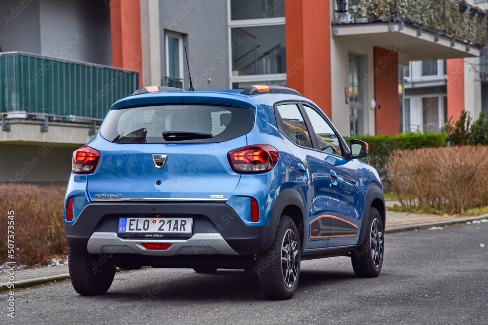 Dacia Spring. A small electric car in the city. General rear view. 01 ...