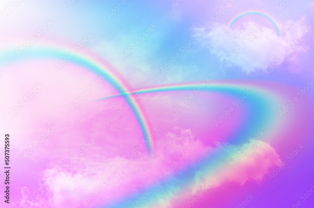 Colorful sky with soft white clouds and the crossing of rainbows ...