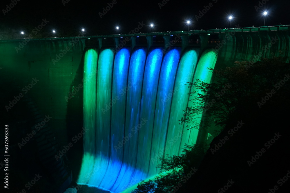 Illuminated Night View of Naruko Dam and lakeside mountains in Osaki ...