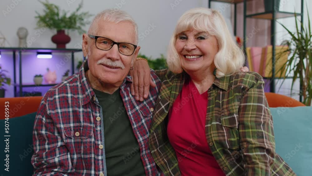 Happy senior elderly family couple grandparents man woman looking at ...