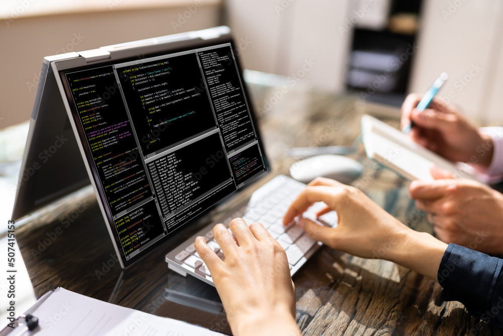 African American Coder Using Computer At Desk Stock Photo | Adobe Stock