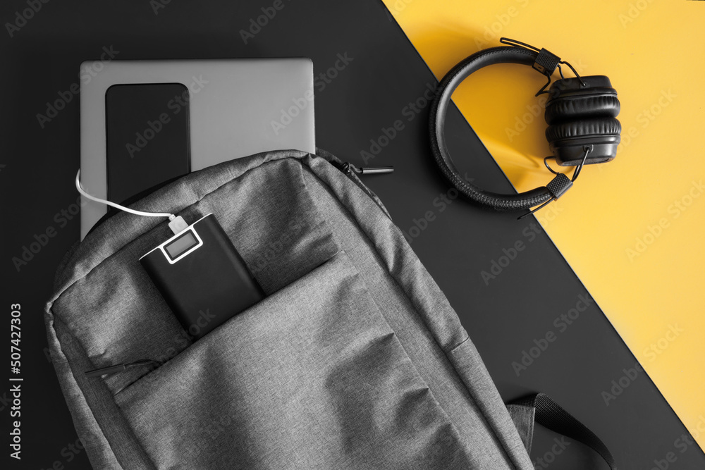 Gray urban backpack with laptop, external battery - power bank and ...