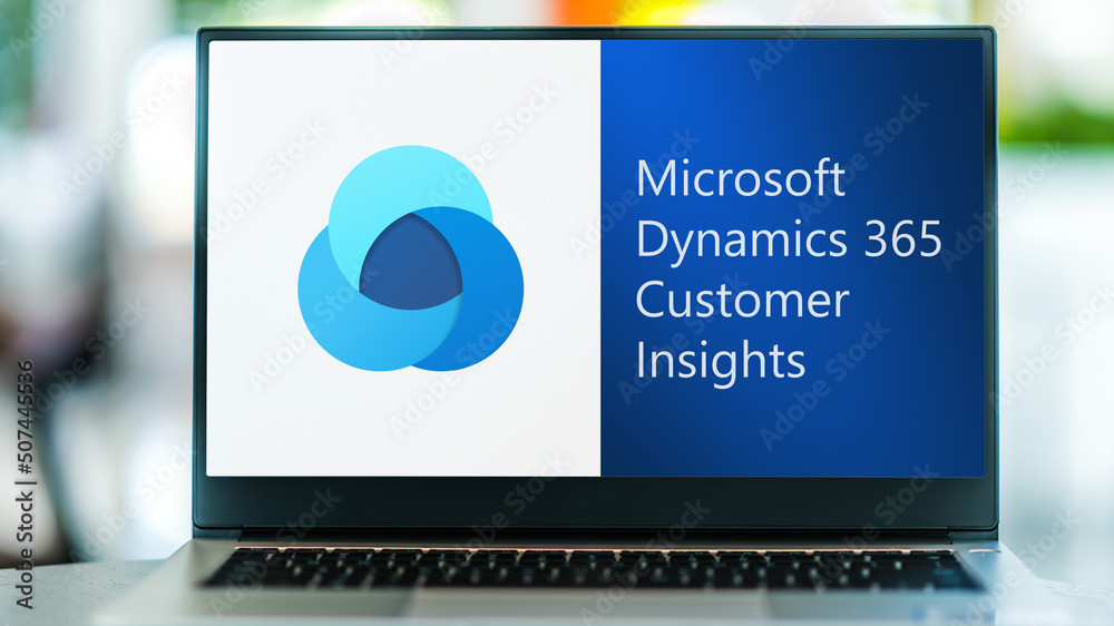 Computer with logo of Microsoft Dynamics 365 Customer Insights Stock ...