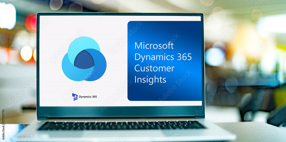 Computer with logo of Microsoft Dynamics 365 Customer Insights Stock ...